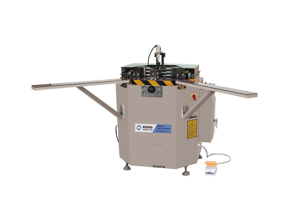 Synchronous corner grouping machine for aluminum doors and windows